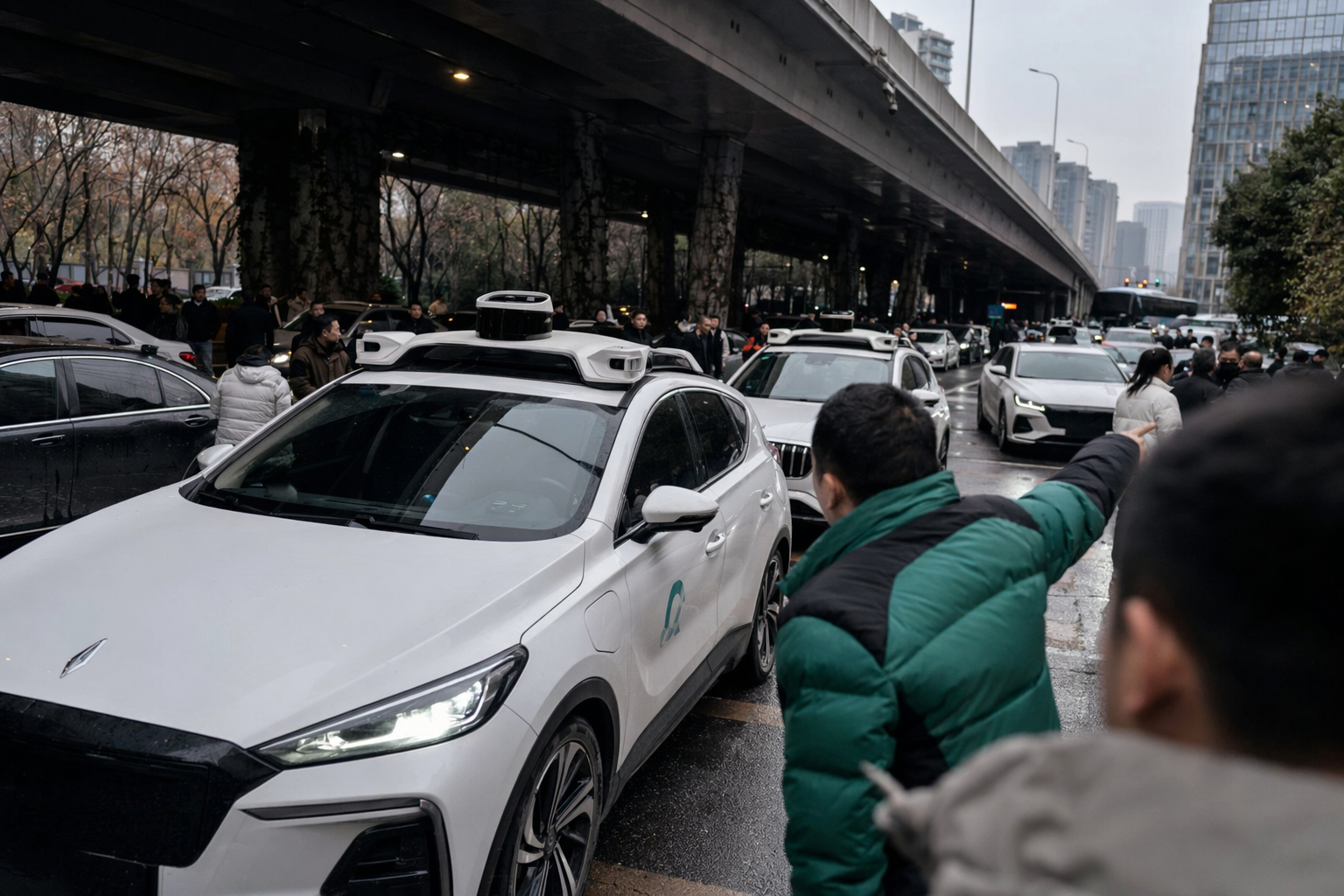 China pauses new autonomous vehicle licenses after Baidu robotaxi chaos ...